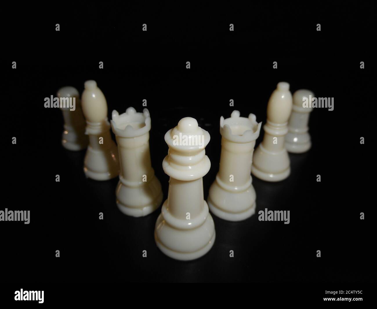 Chess photographed on portrait of black background Stock Photo - Alamy