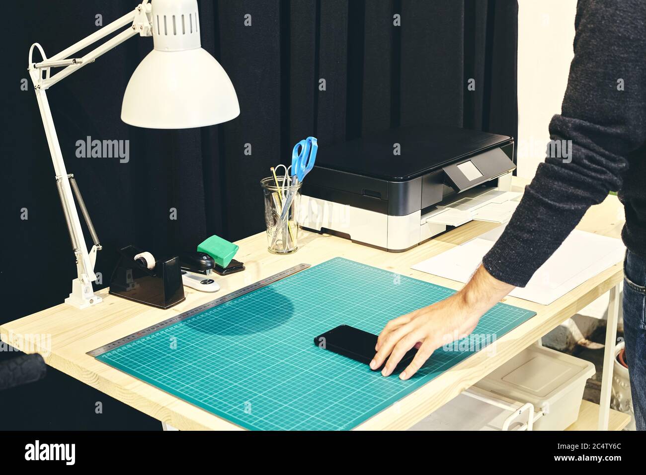 Employee working on the office desk Stock Photo - Alamy