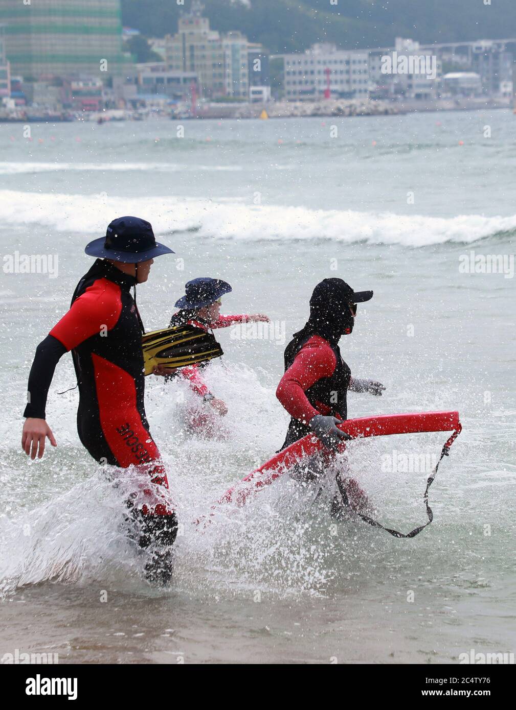 29th June, 2020. Rescue drill at beach Lifeguards enter the water to ...
