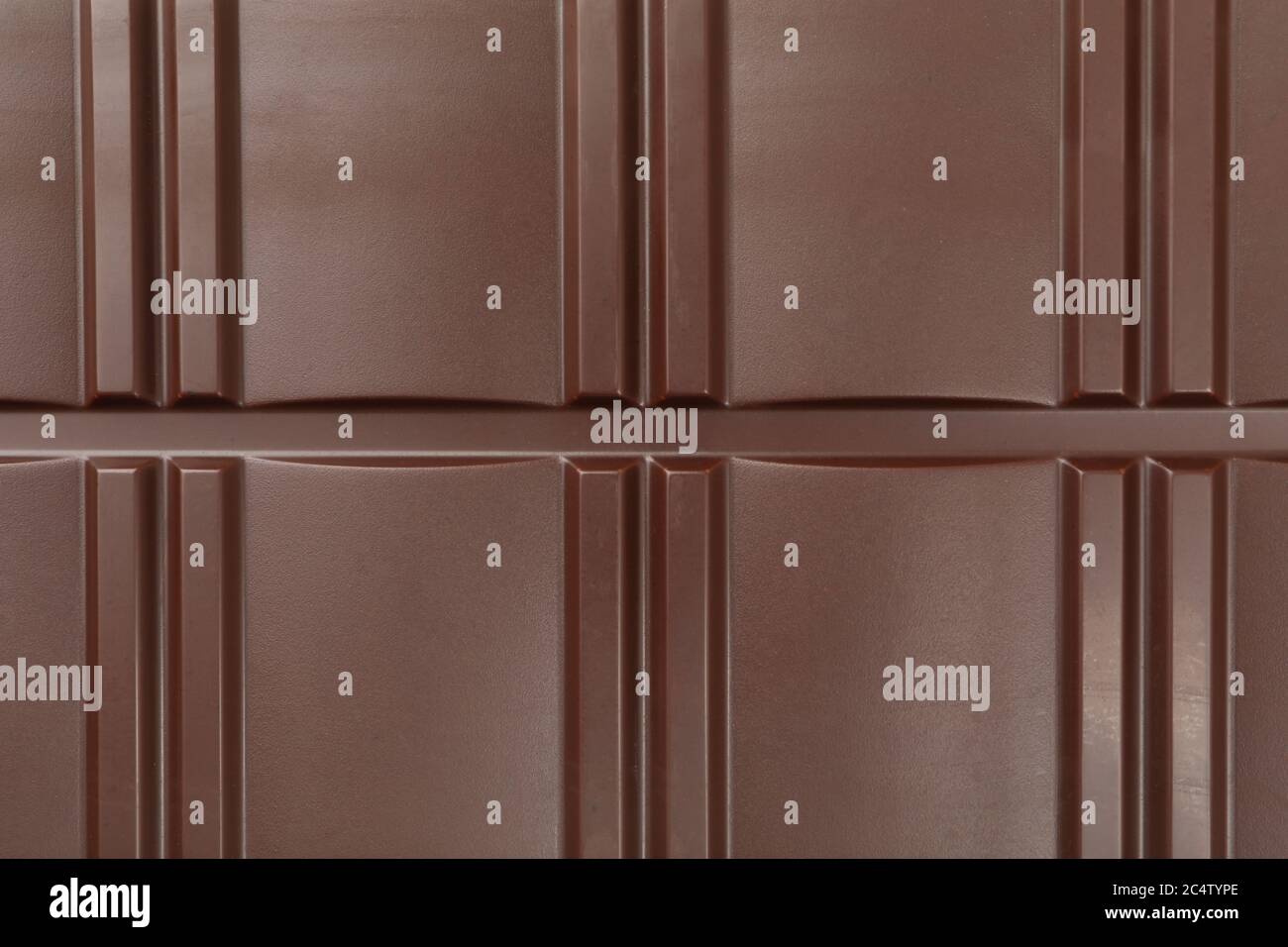 Chocolate bar texture on whole background, close up Stock Photo - Alamy