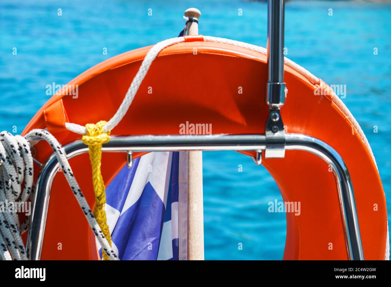 Composition with lifebuoy ring. Sailing yacht catamaran boat on ...