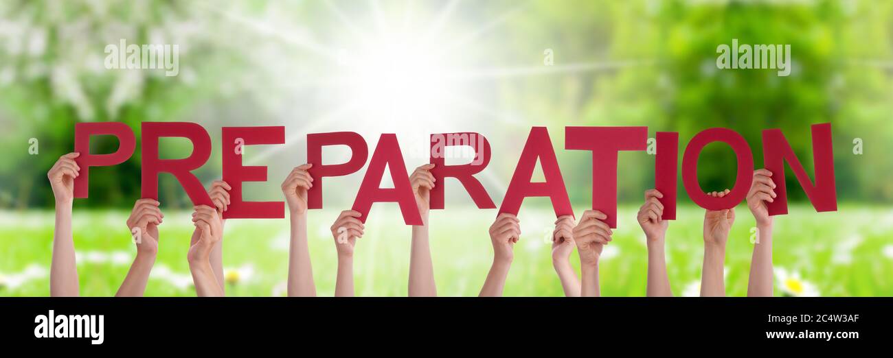 People Hands Holding Word Preparation, Grass Meadow Stock Photo - Alamy