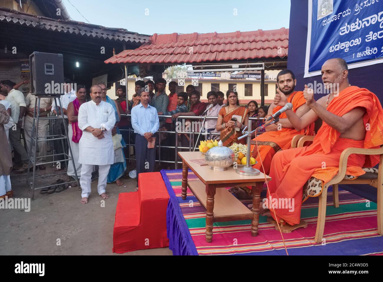 A senior Hindu priest addresses a crowd at Shri Krishna Matha or ...