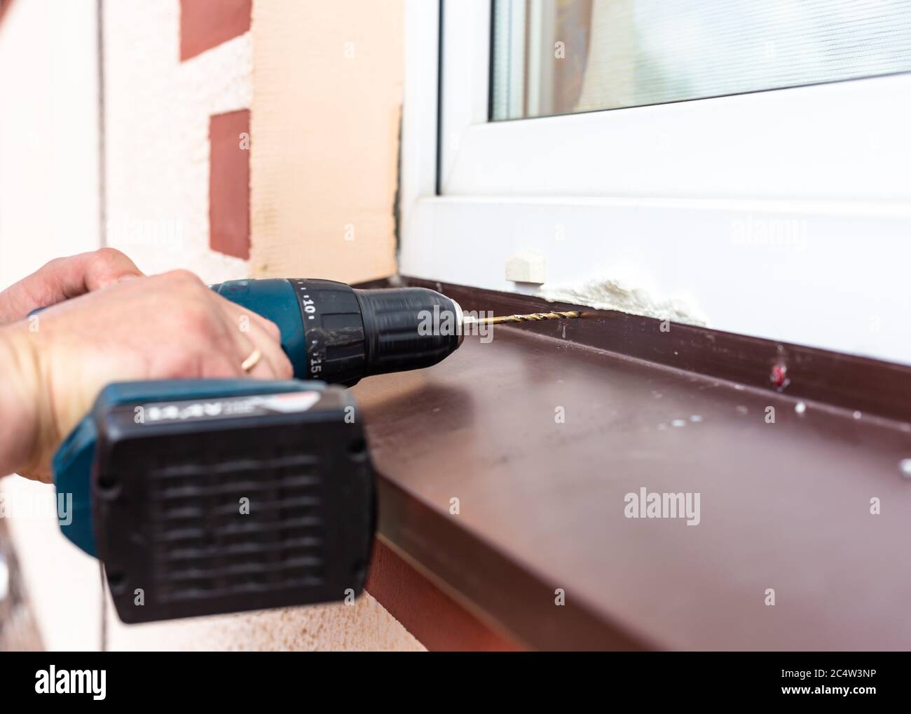 Construction work - drilling holes Stock Photo - Alamy