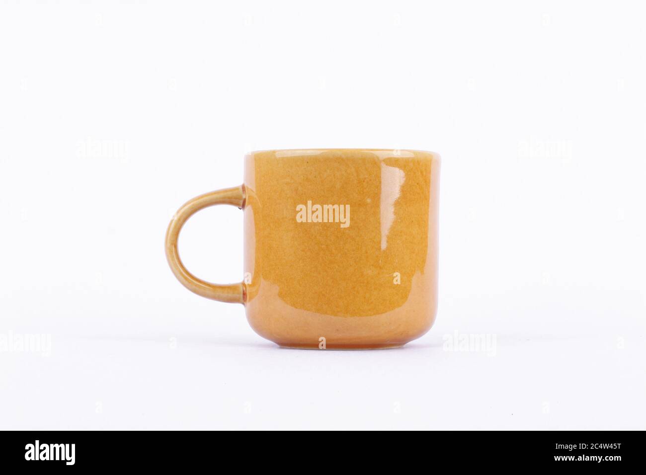 Brown coffee cup made of ceramic Stock Photo - Alamy