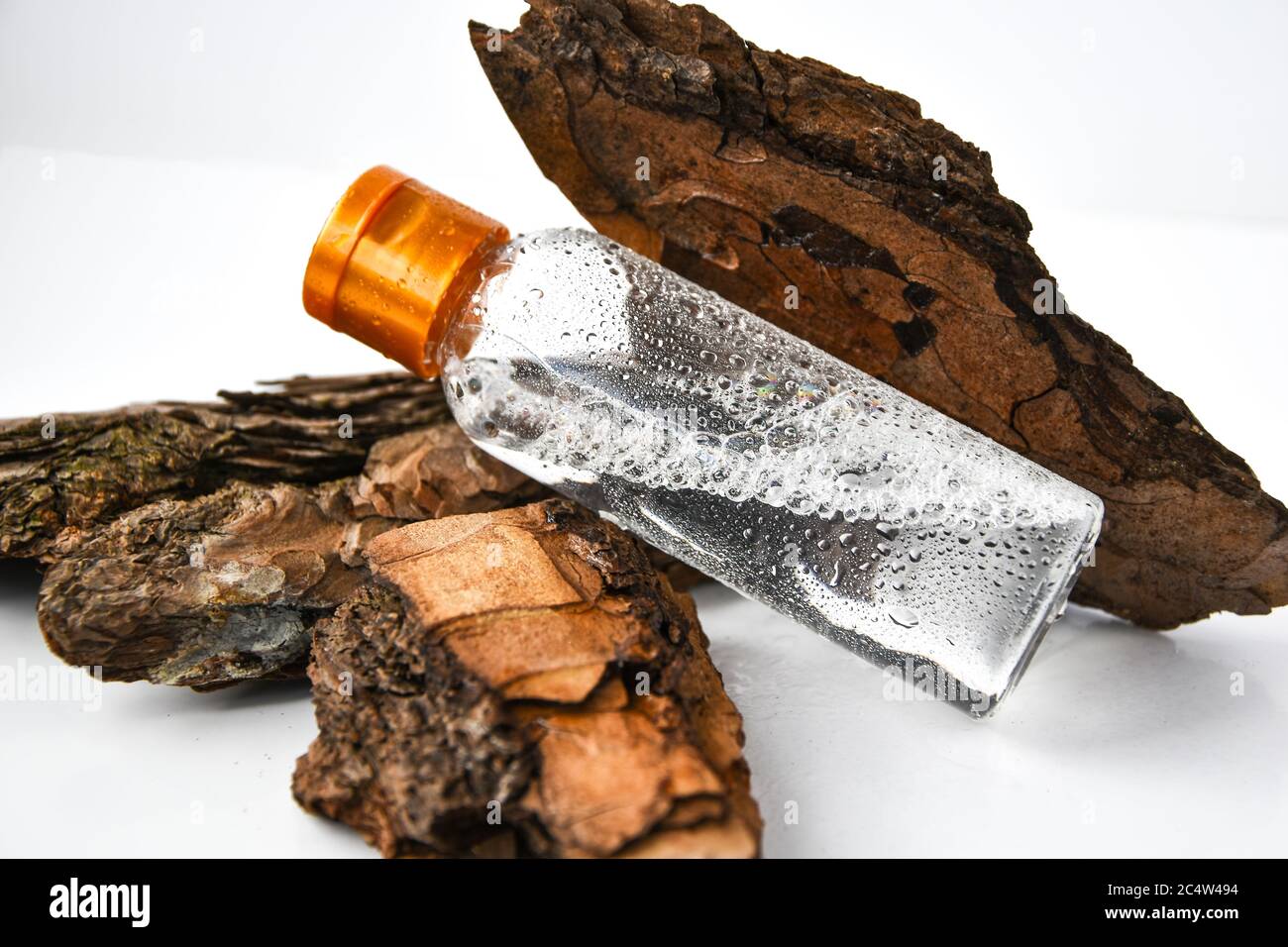 Perfume in tree bark with drops of water. texture. concept of freshness ...