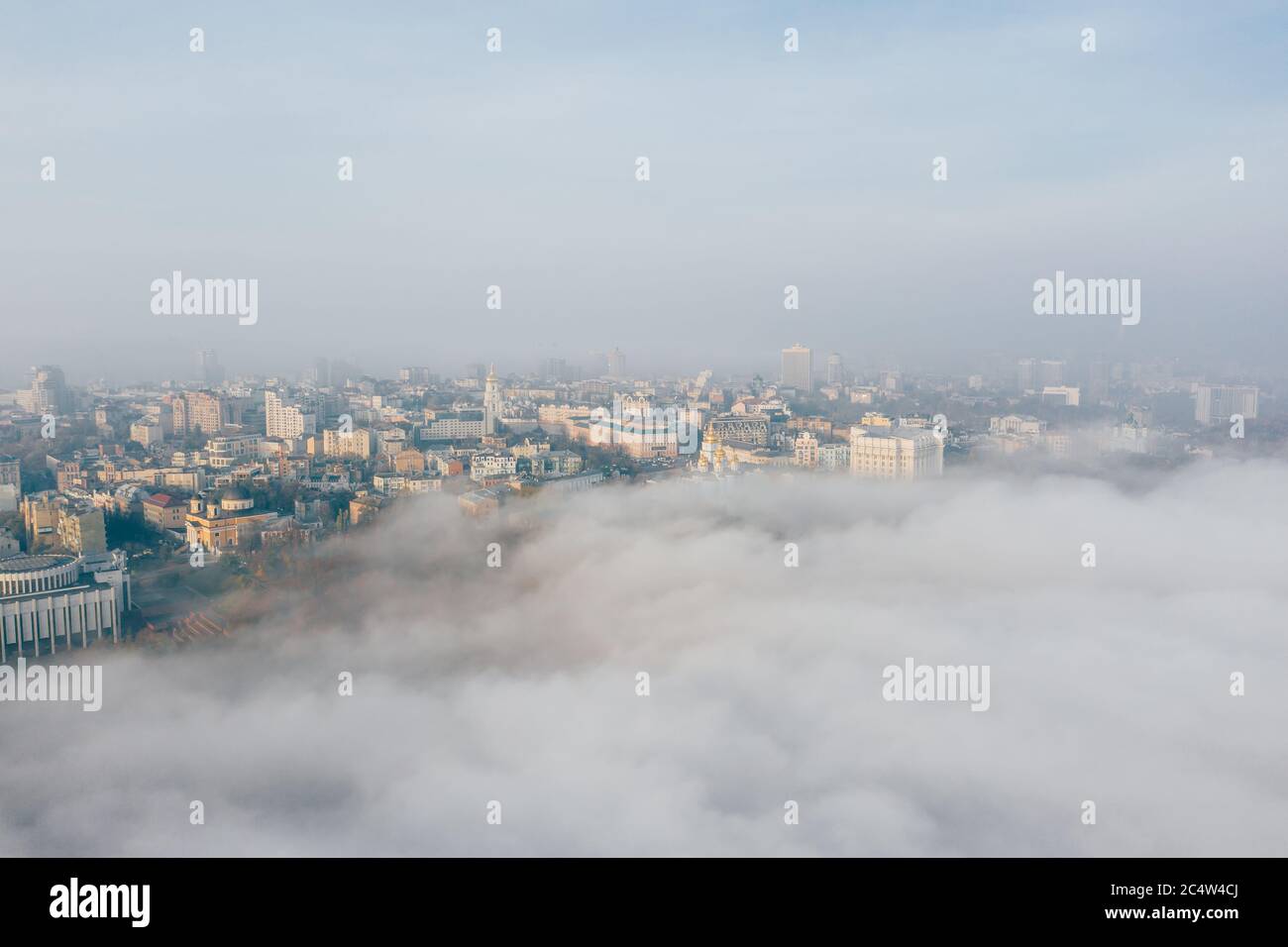 Aerial view of the city in the fog Stock Photo - Alamy