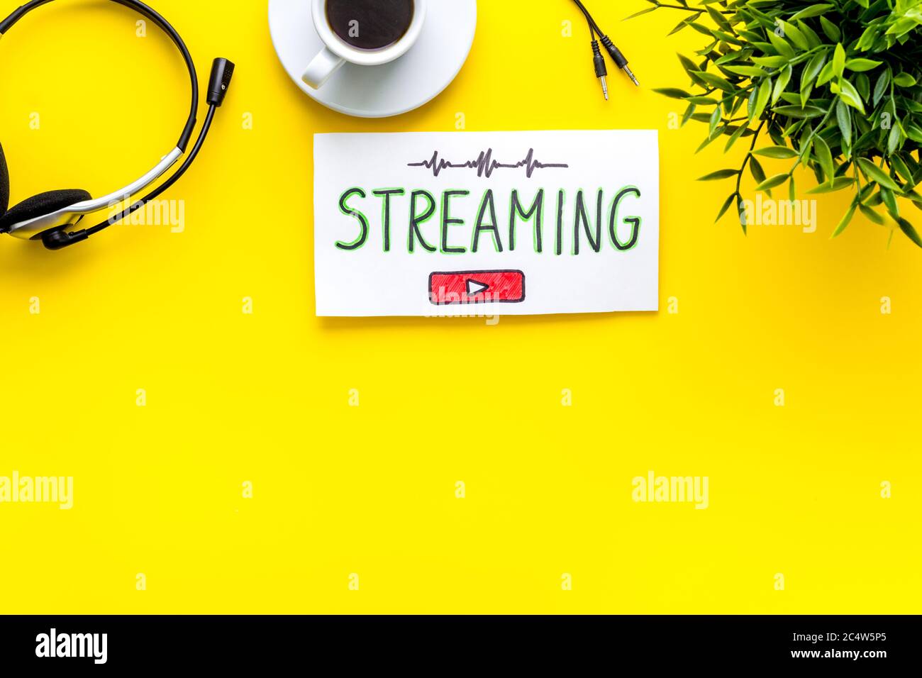 Online streaming social media concept. Paper tablet on office desk top ...