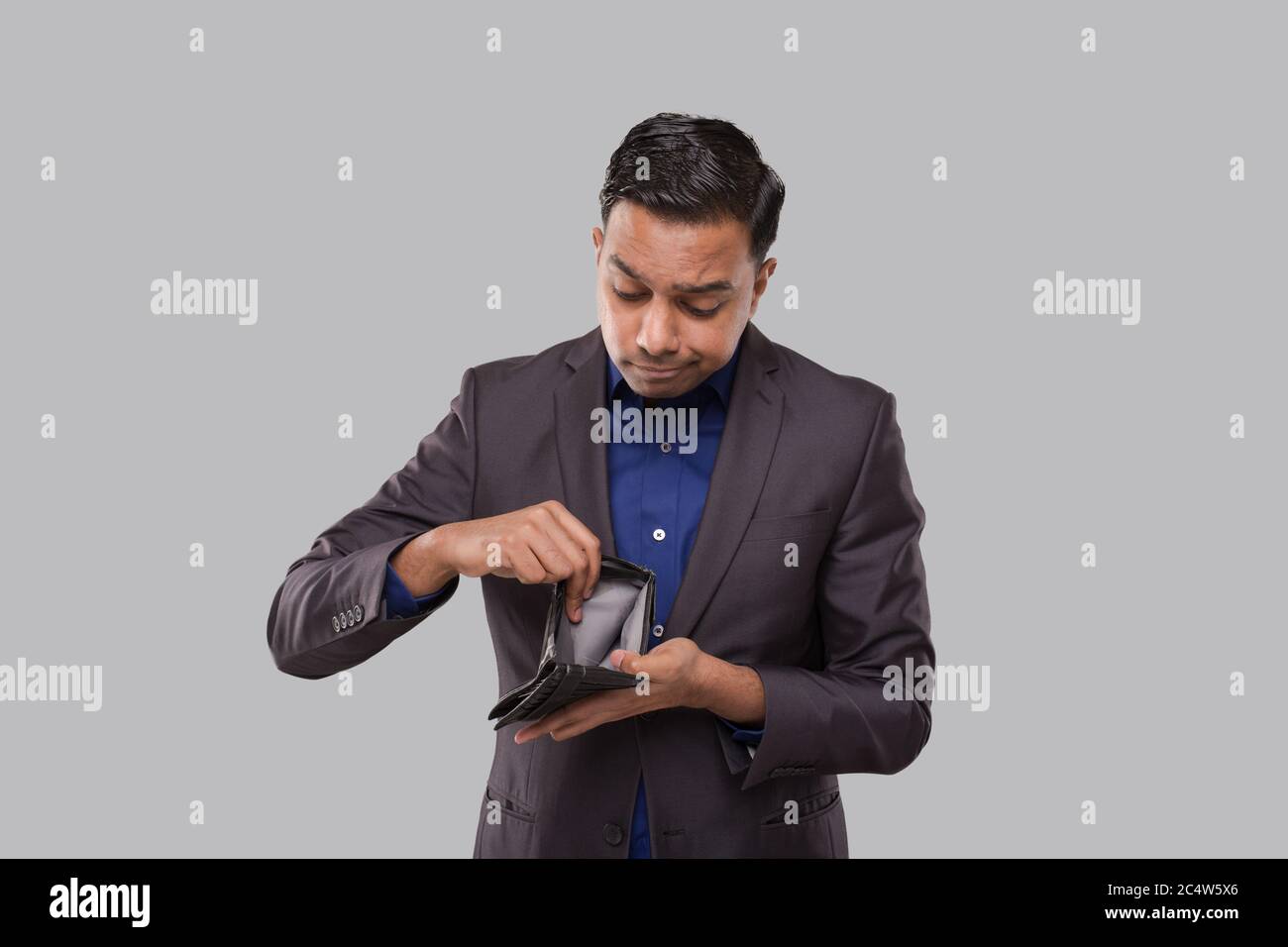 Businessman Holding Empty Wallet. Indian Business man No money, no ...