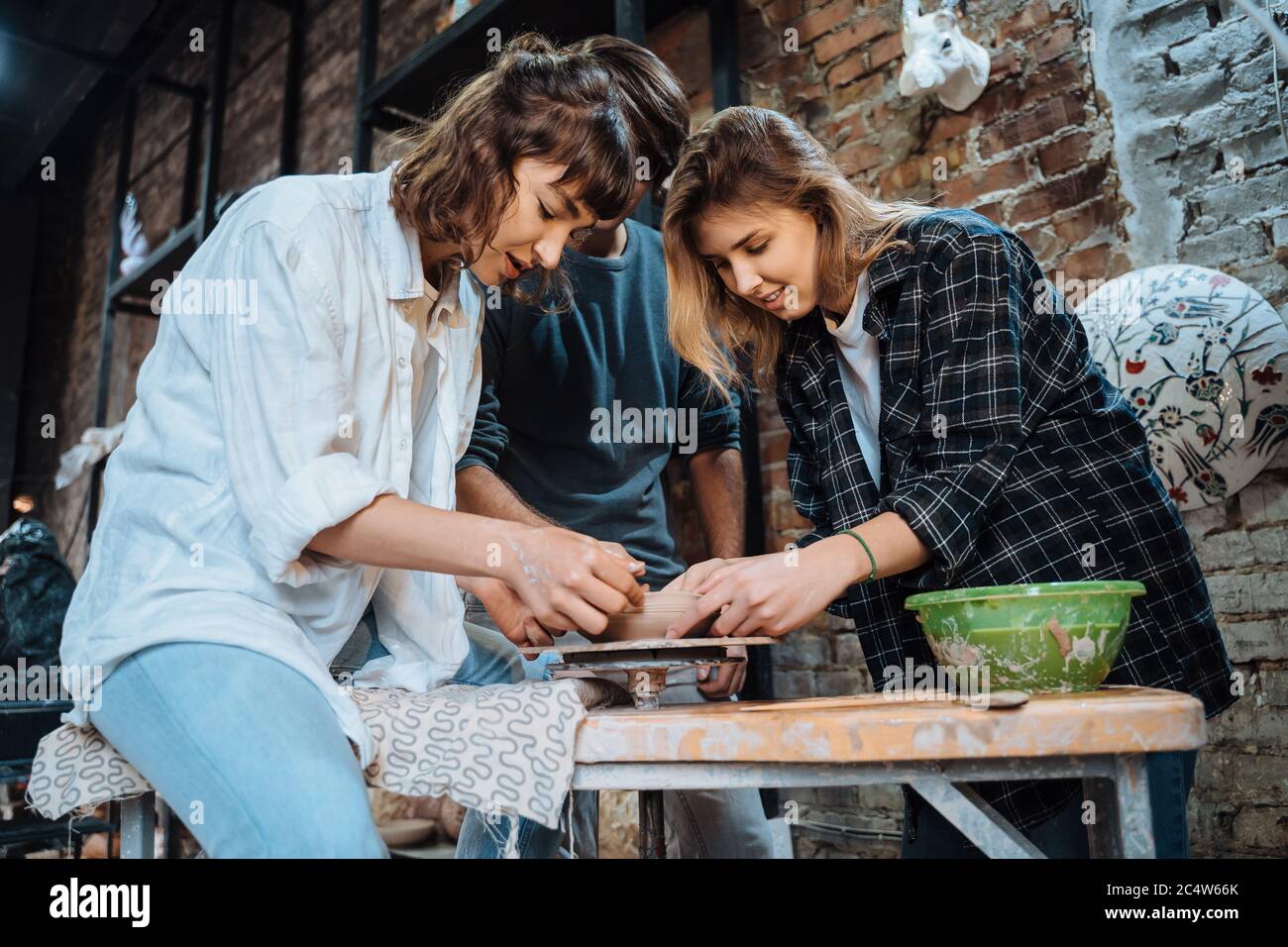 Making a handmade clay pot. Pottery lesson, hobby Stock Photo - Alamy