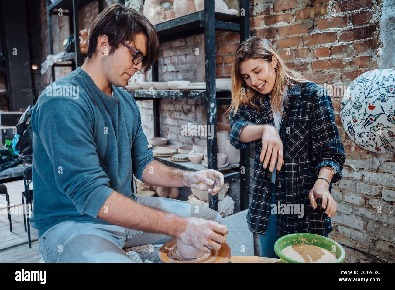 Making a handmade clay pot. Pottery lesson, hobby Stock Photo - Alamy