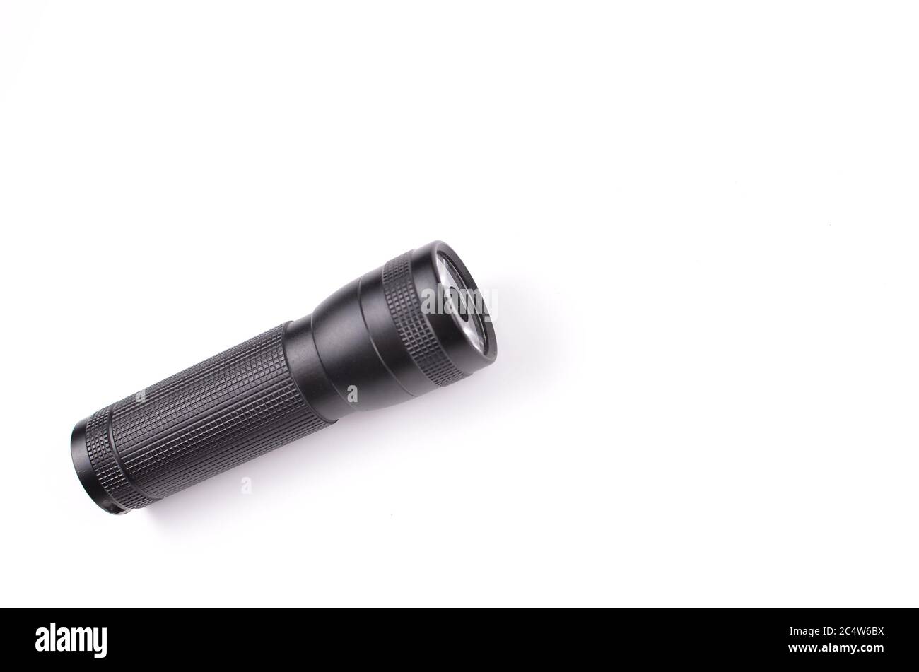 Black flashlight isolated on a white background Stock Photo - Alamy