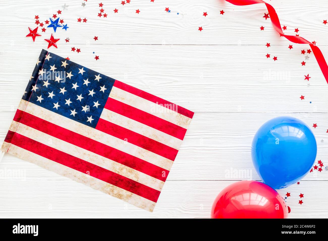 4th July greeting card with American flag and balloons flat lay copy ...