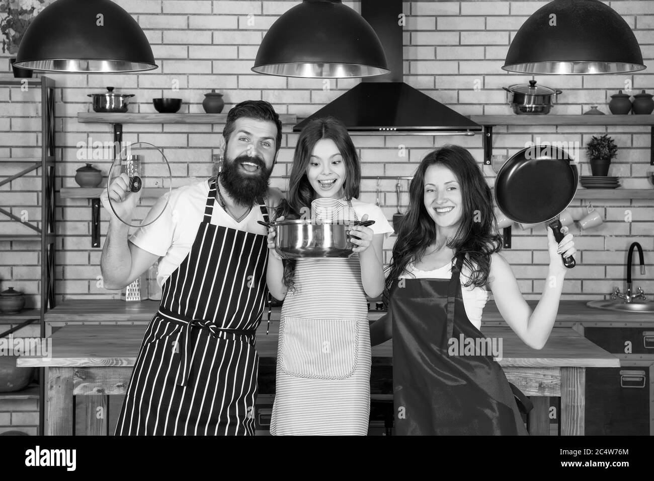 Cooking at home. Preparing food. kid chef cook dinner with parents ...