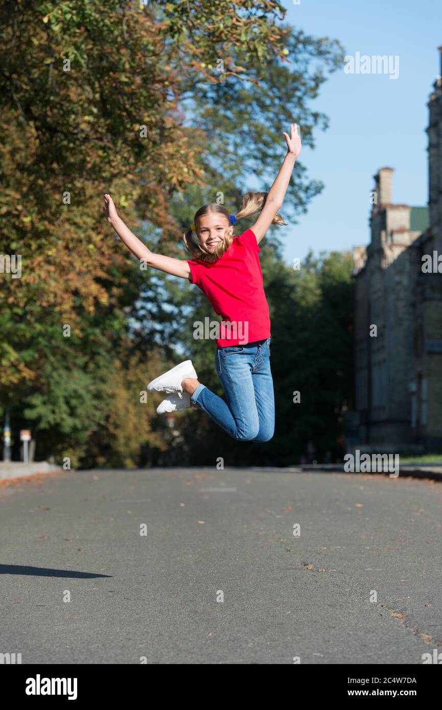 Do more of what makes you happy. Happy child jump high outdoors. Happy ...