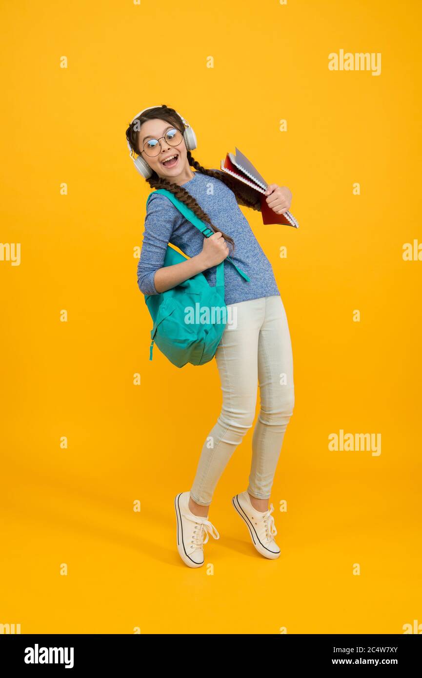 Feel the impact. Regular school day. Stylish schoolgirl. Girl carry ...
