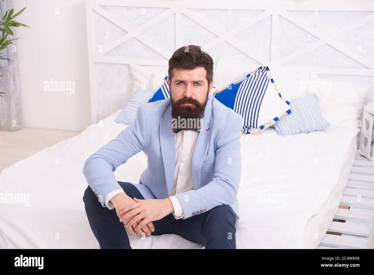 I am ready. Morning habits. Bearded hipster in bedroom. Morning ...