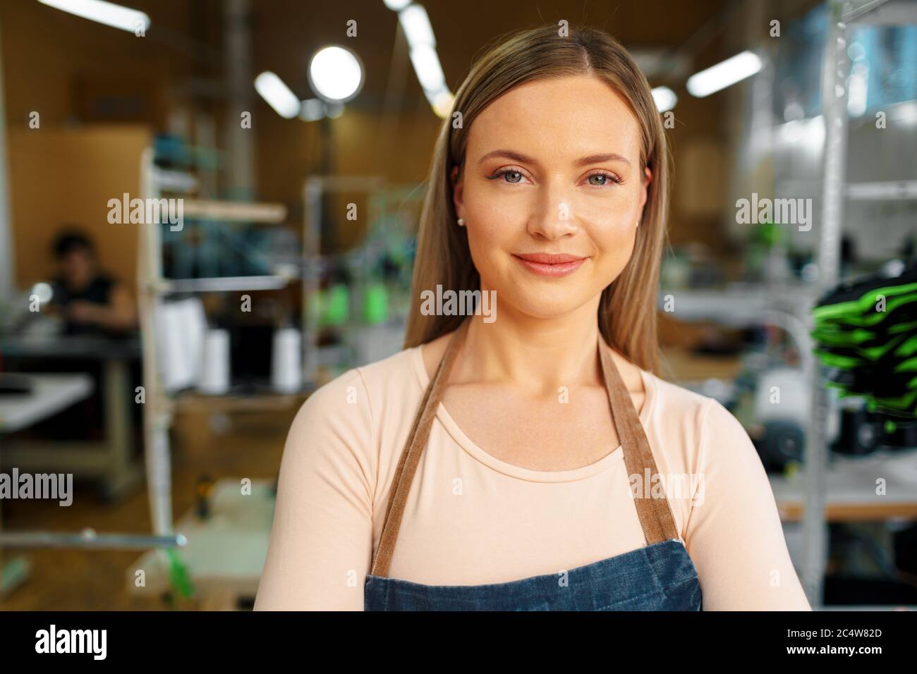 Young woman seamstress posing hi-res stock photography and images - Alamy