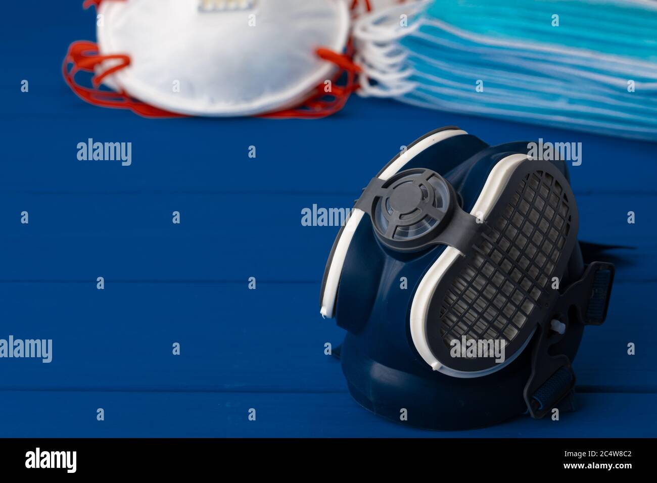 Respirator half mask with medical face mask. Health protection concept ...