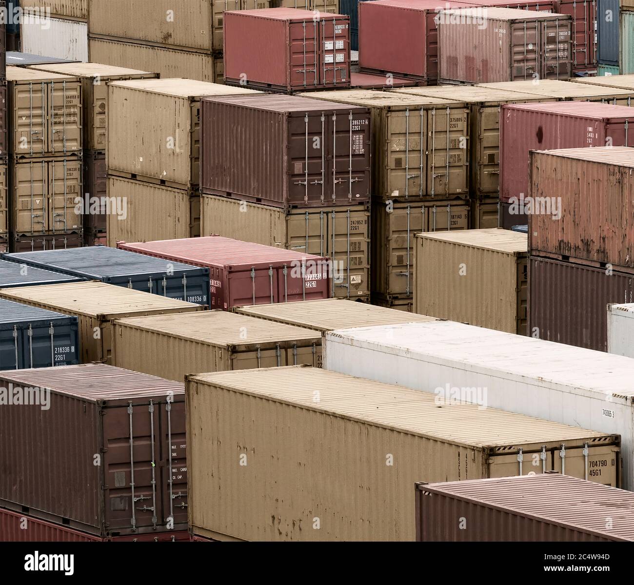 Stacked Shipping Containers At Cargo Port Stock Photo - Alamy
