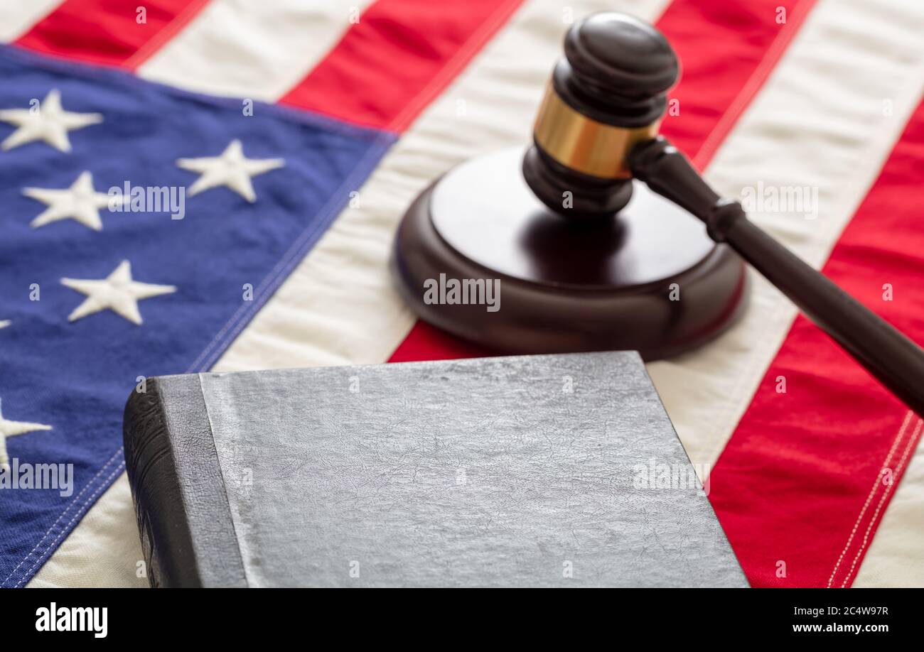Law case closed. Judge gavel and book on US of America flag background ...