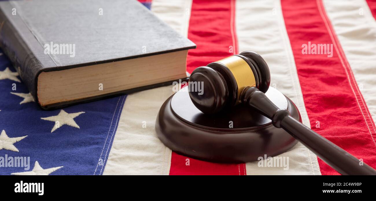 Law case closed. Judge gavel and book on US of America flag background ...
