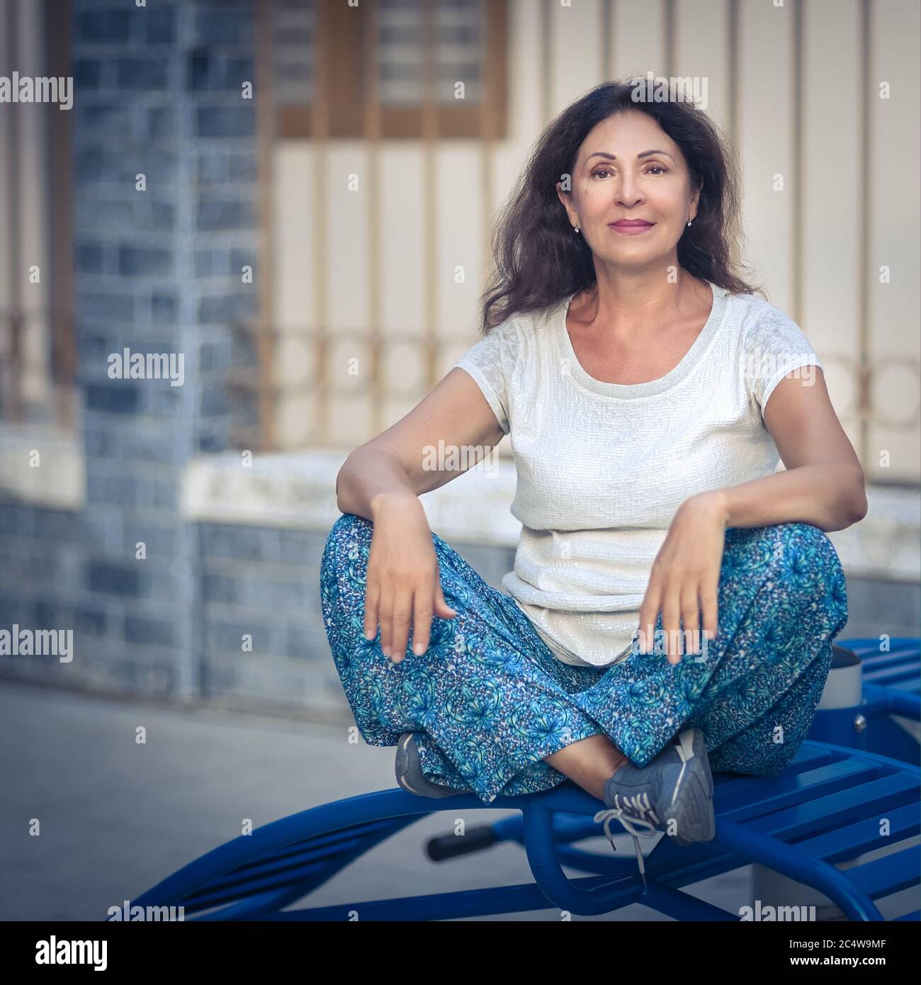 Outdoor portrait of a beautiful smiling senior woman Stock Photo - Alamy