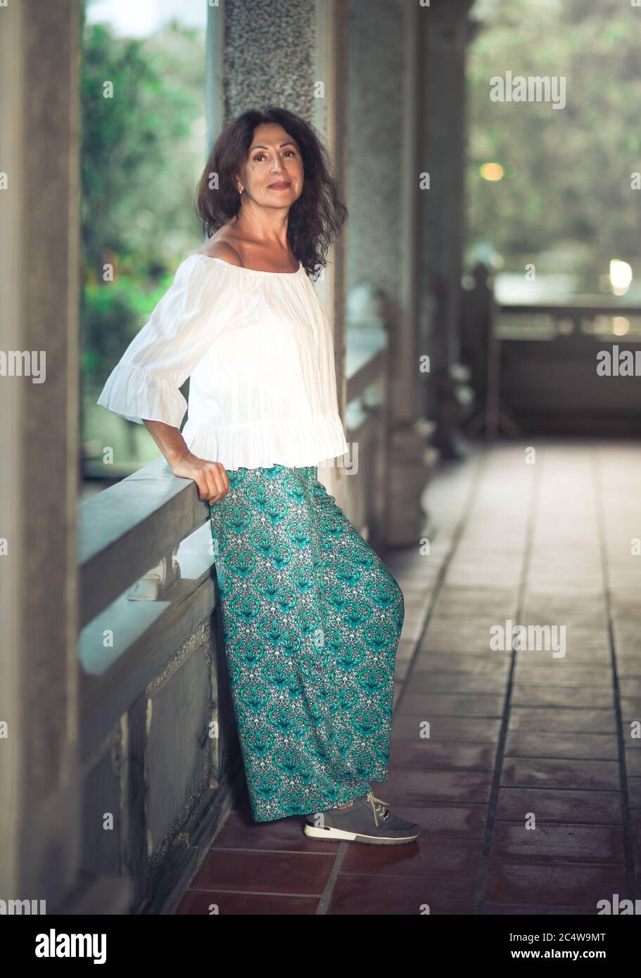 Outdoor portrait of a beautiful smiling senior woman Stock Photo - Alamy