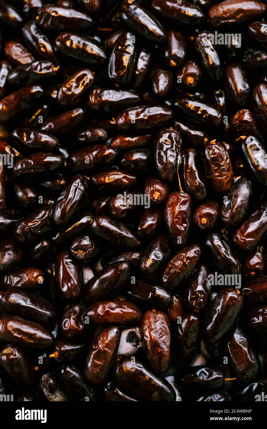 Close-up date fruit. The texture of dried fruit Stock Photo - Alamy