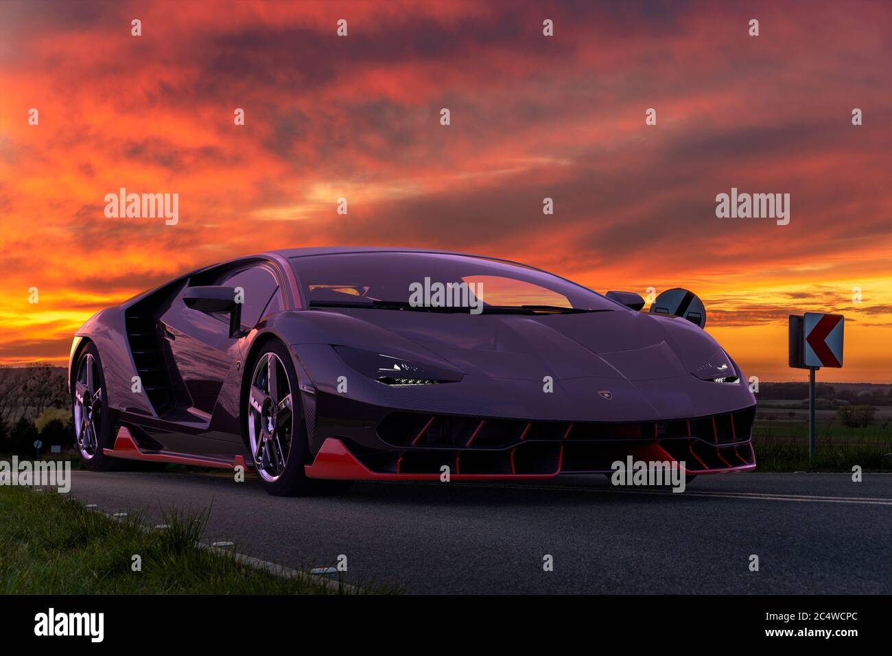 Lamborghini supercar driving down the road during a dramatic sunset ...