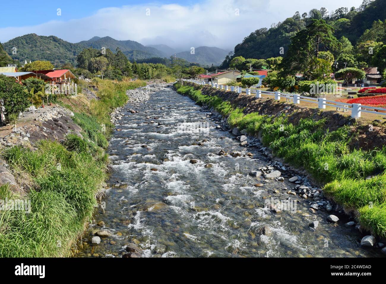 The Caldera river and gardens of Boquete on the background of mountains ...