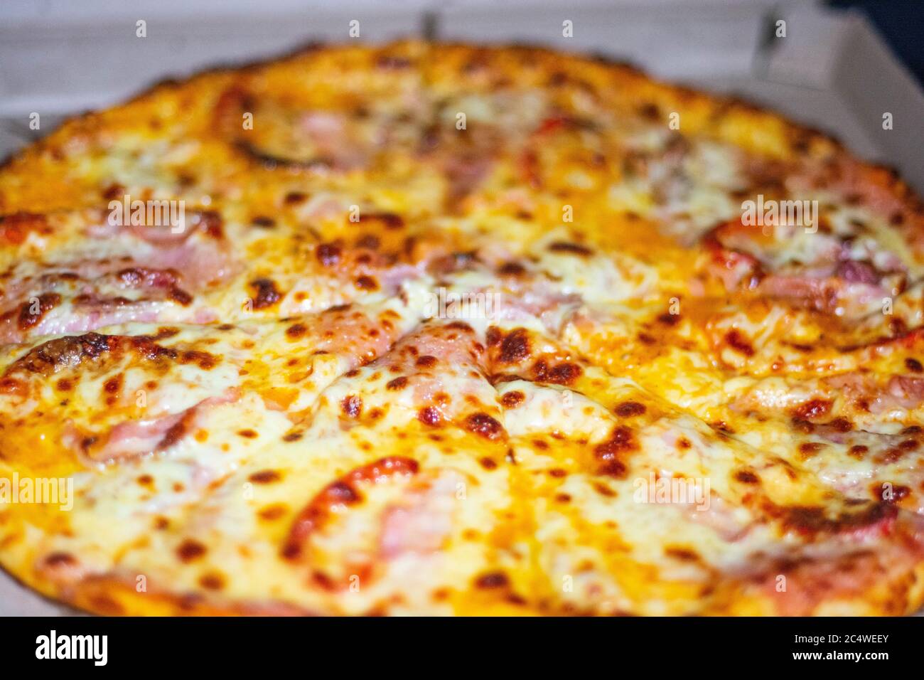 Top view of a delicious ham and cheese pizza Stock Photo - Alamy