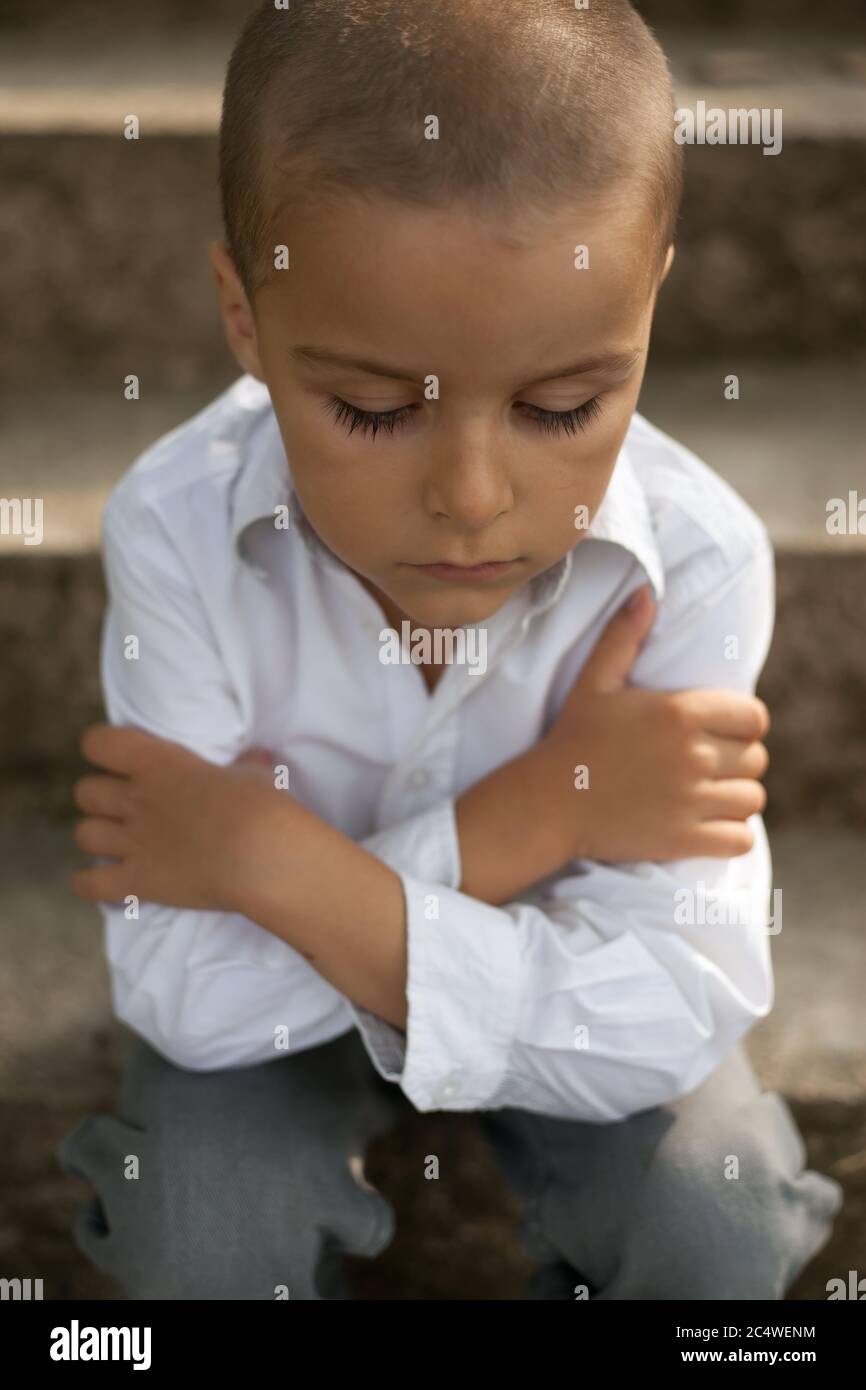 portrait of a sad boy Stock Photo - Alamy