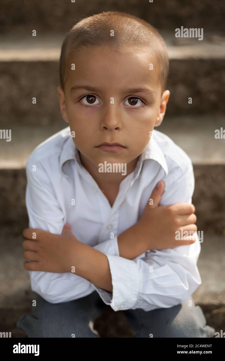 portrait of a sad boy Stock Photo - Alamy