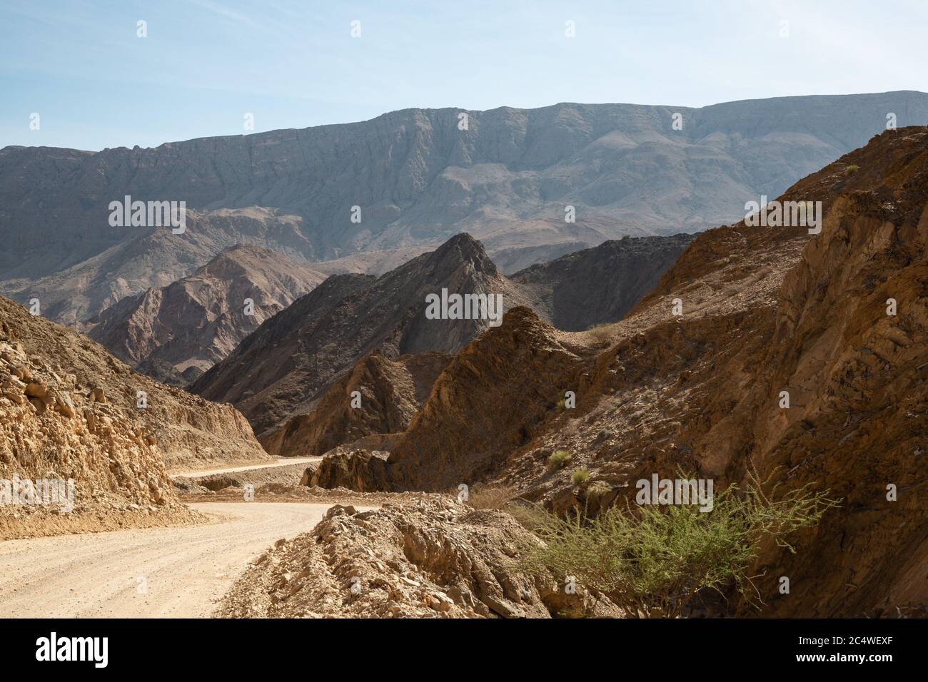 Gravel road and mountain landscape in Oman Stock Photo - Alamy