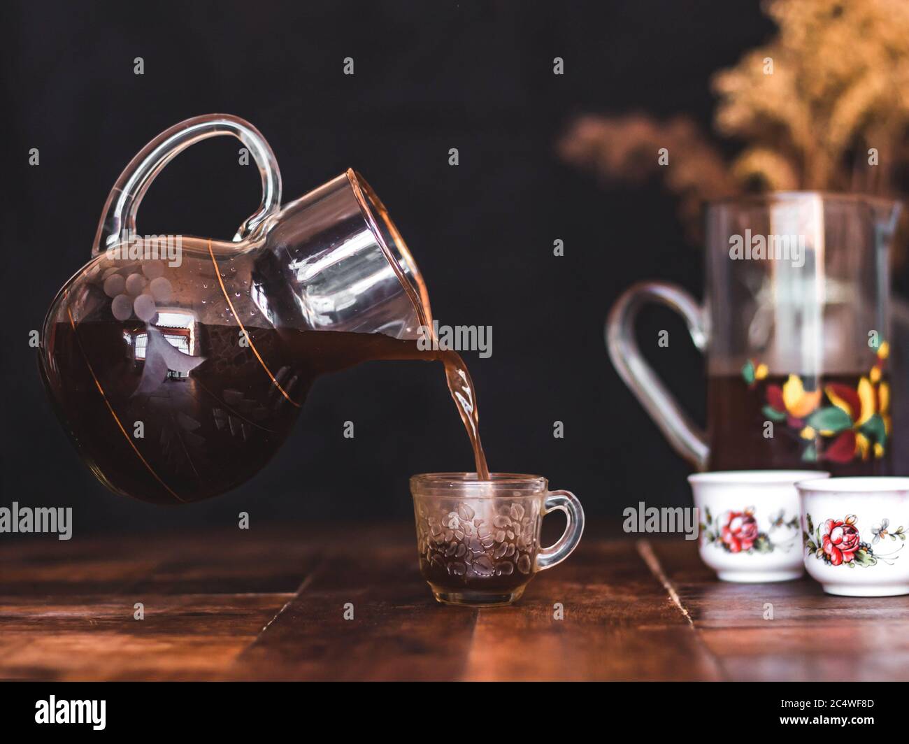 Pouring hot coffee in transparent hi-res stock photography and images ...