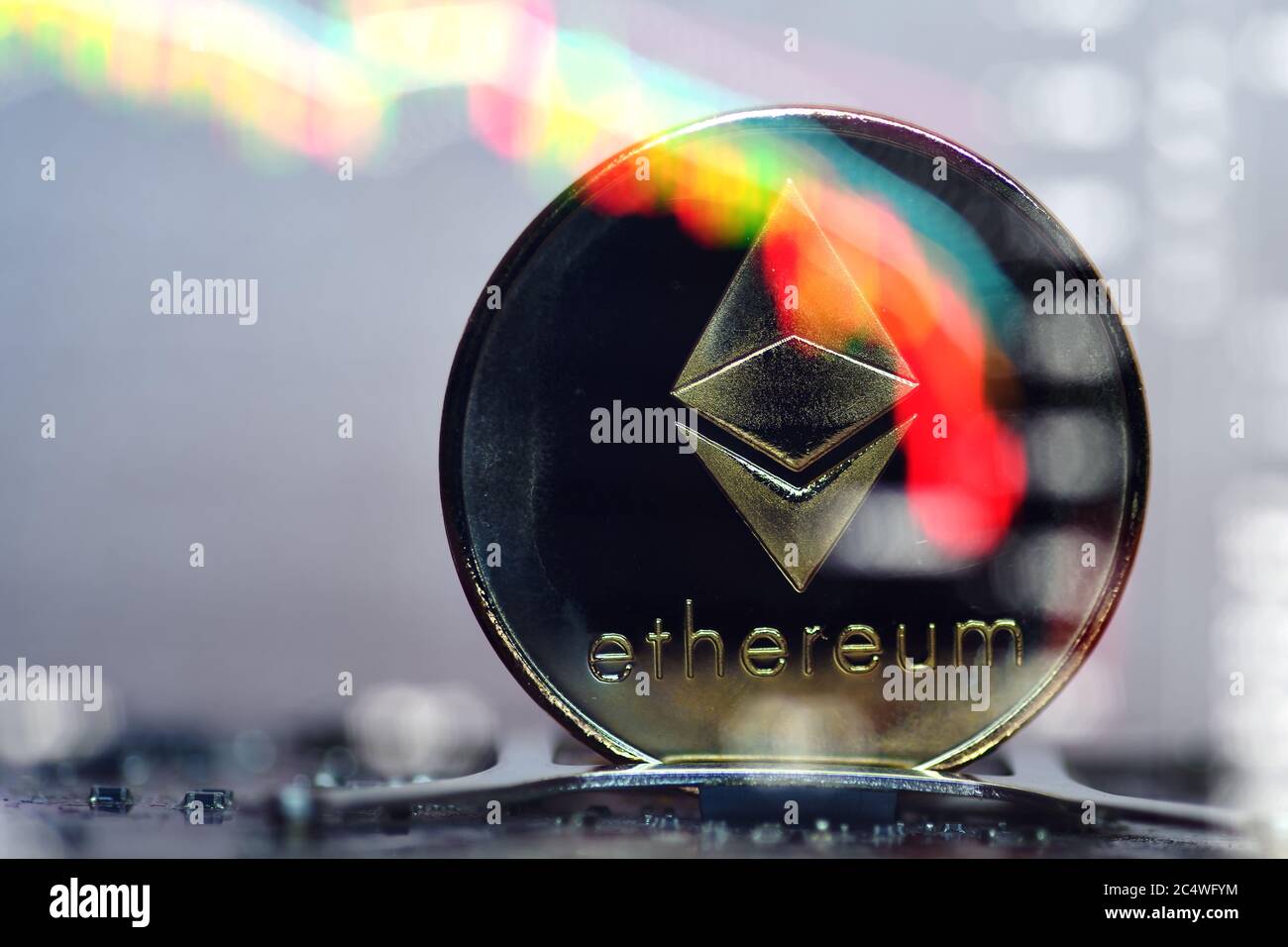 Ethereum. Crypto currency. Ethereum golden coin and a chart. Blockchain ...