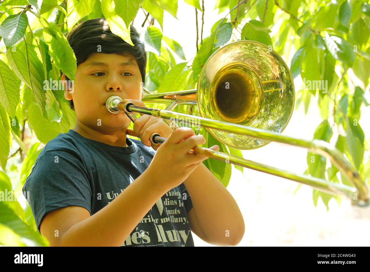 Children Playing Trombone High Resolution Stock Photography and Images - Alamy