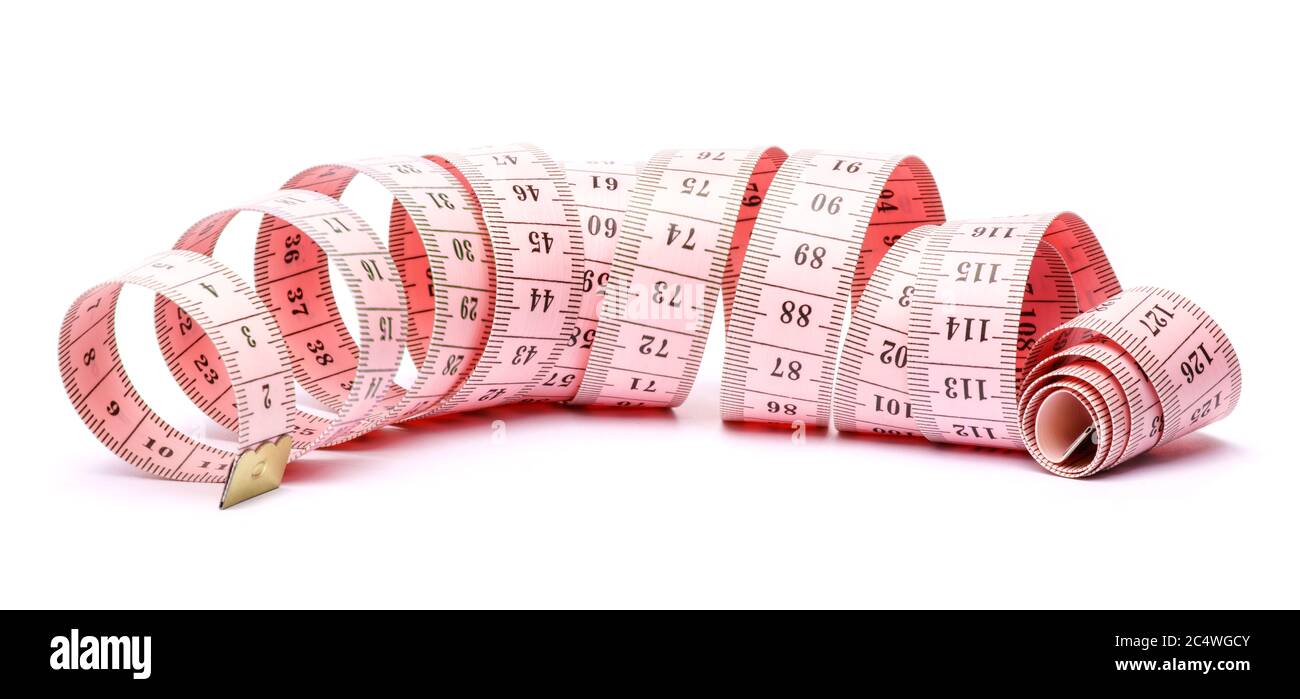 Pink measuring tape isolated on white background Stock Photo - Alamy