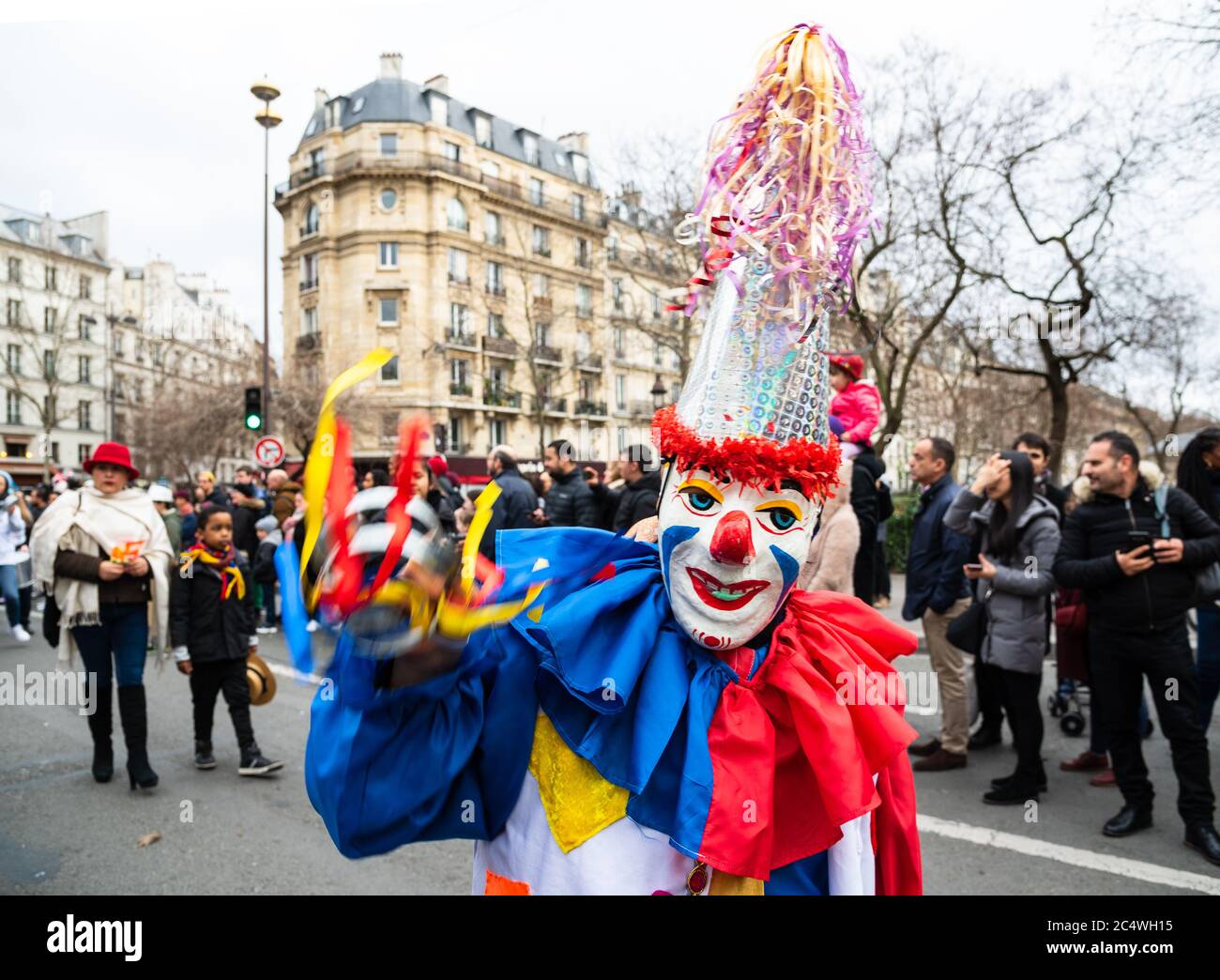 PARIS, FRANCE - FEBRUARY 23, 2020: Man in clown costume at traditional ...