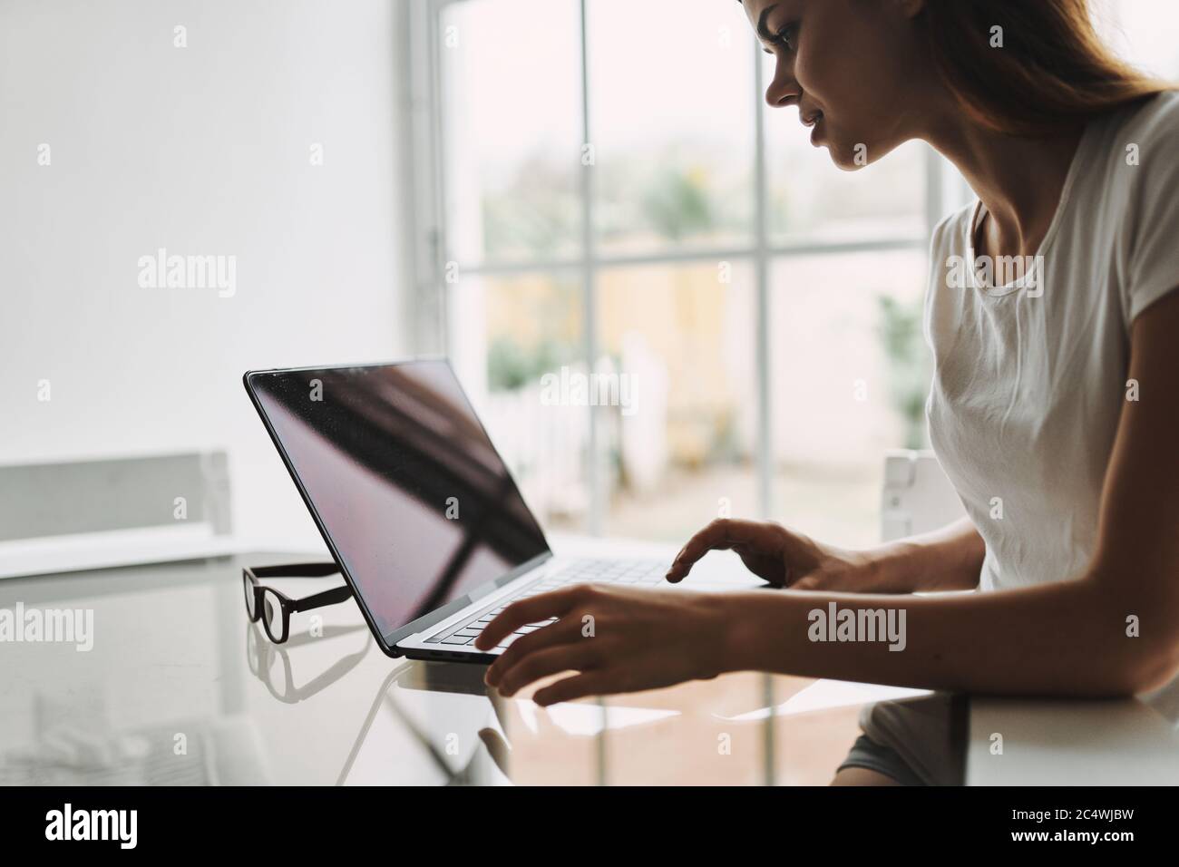 Beautiful woman desktop laptop professional Stock Photo - Alamy