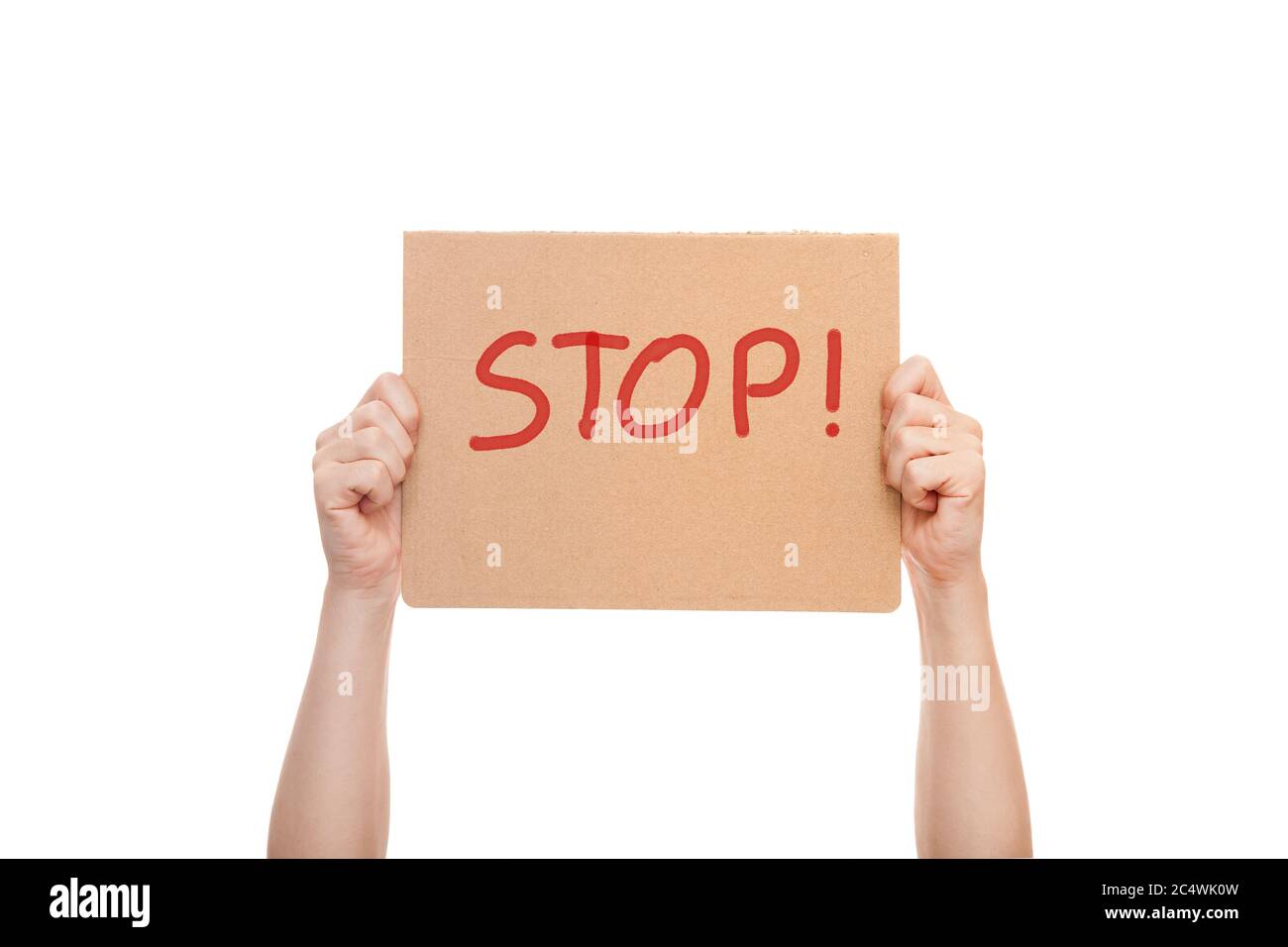 demonstrator hands are holding protest poster with the message Stop ...