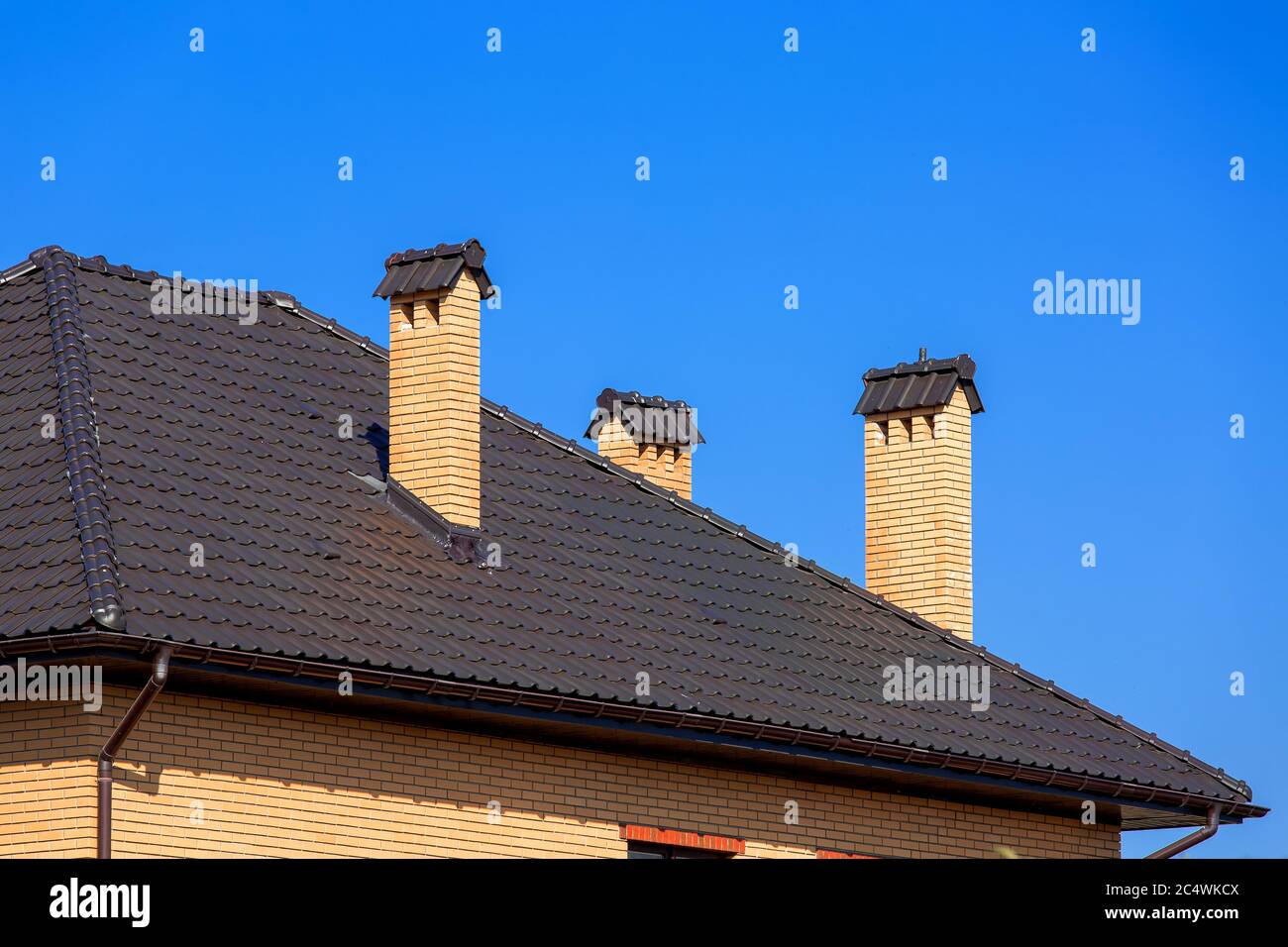 a roof of a ceramic tile with ventilation by a pipe a storm drainage ...