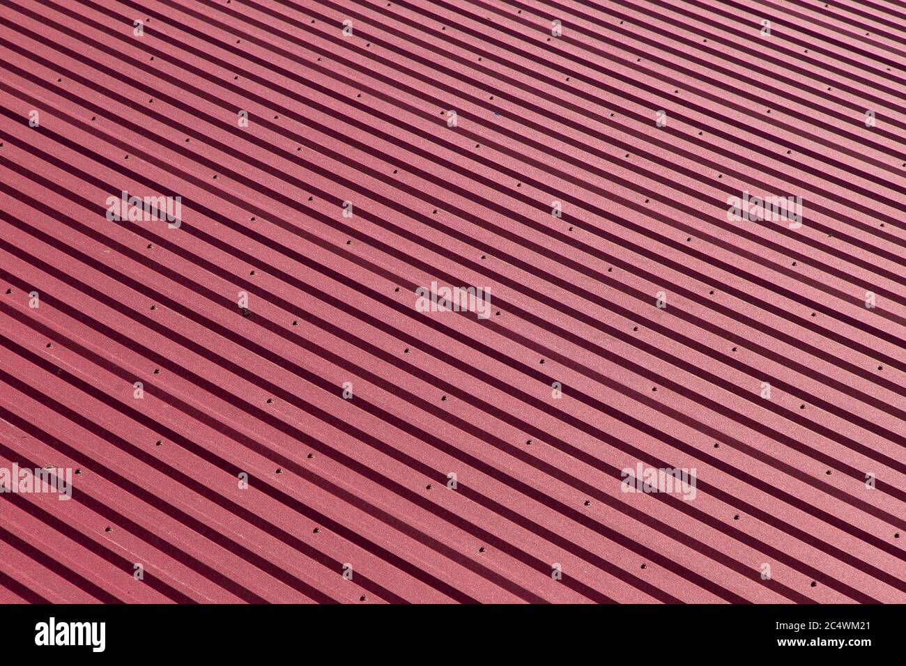 the metal roof covering red color, close-up texture Stock Photo - Alamy