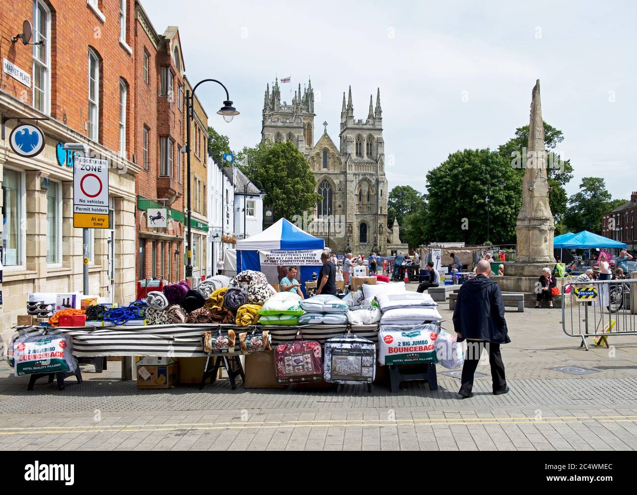Market stalls and abbey in Selby, North Yorkshire, England UK Stock ...