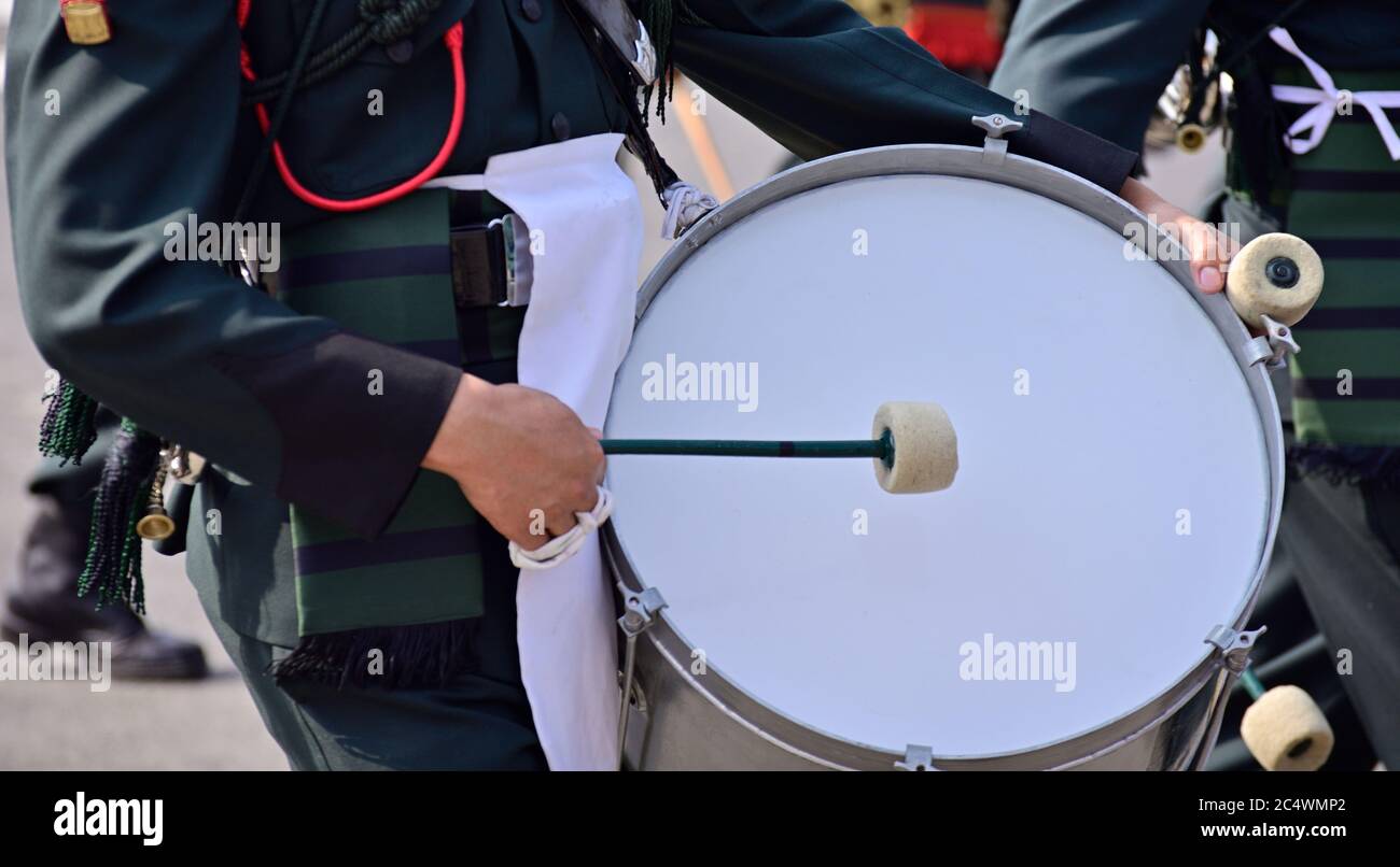 Close-up of drummer is playing music in a music band Stock Photo - Alamy