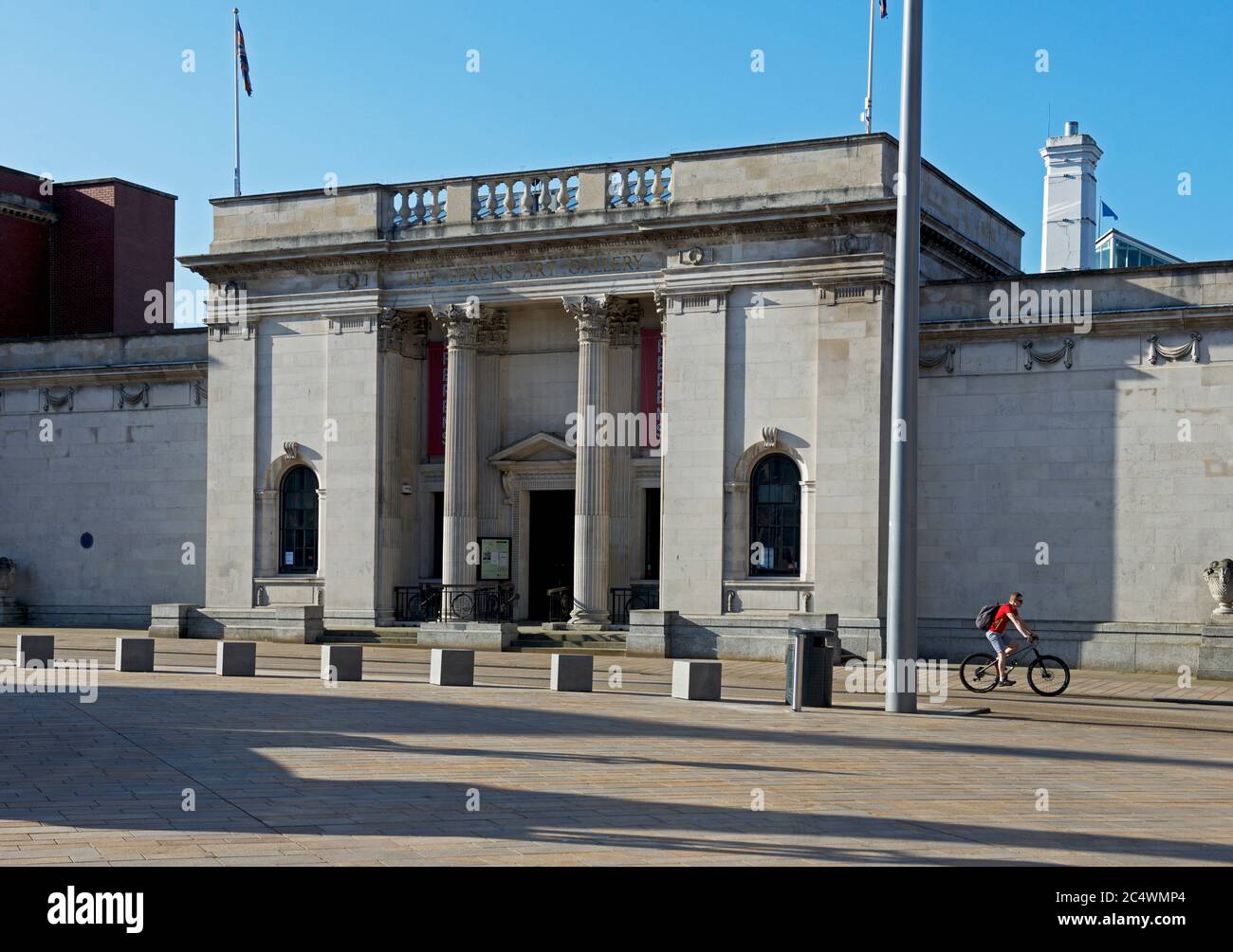 Man cycling past Ferens Art Galley, Hull, Humberside, East Yorkshire ...
