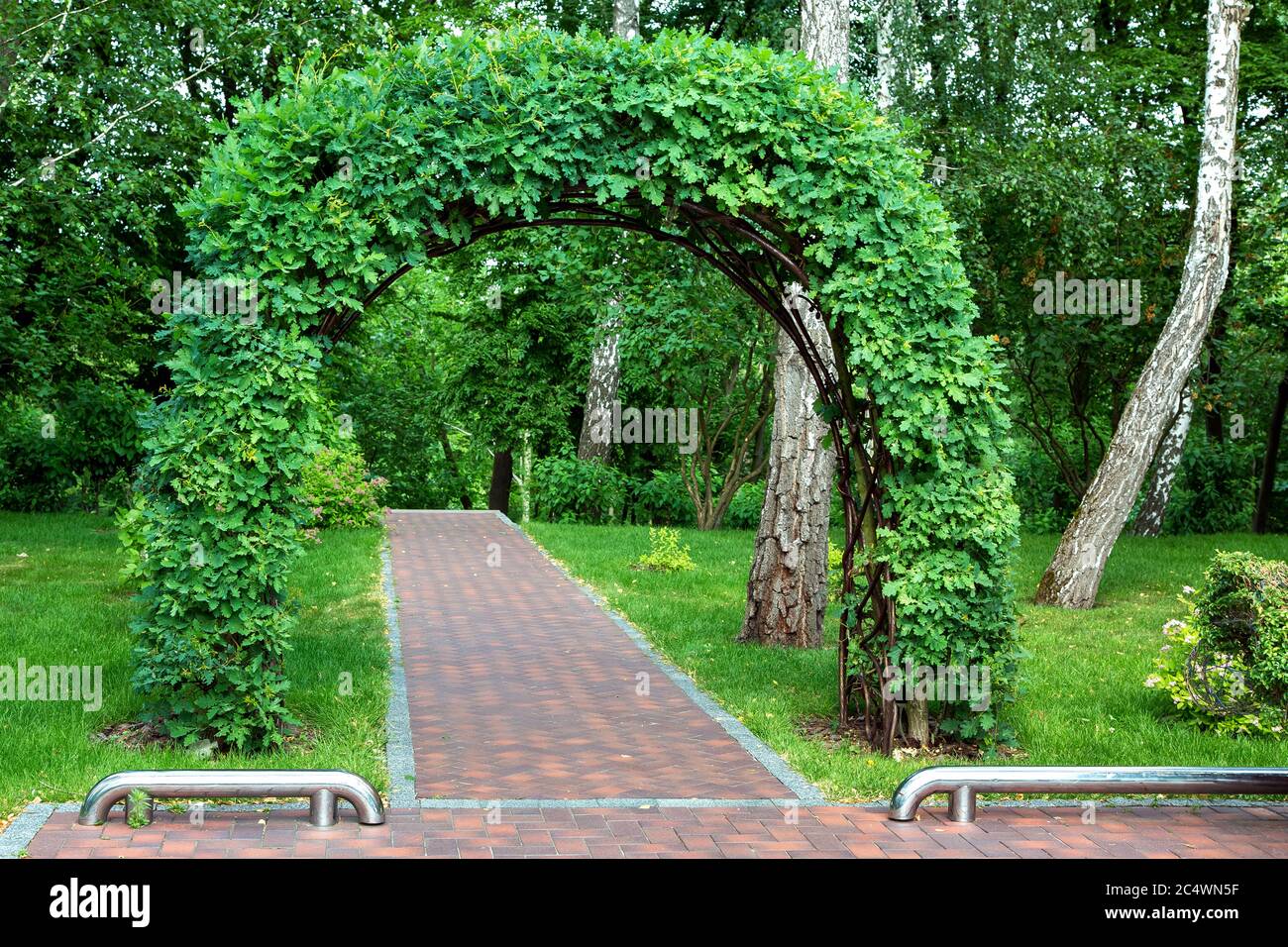 Beautiful garden archway lush hi-res stock photography and images - Alamy