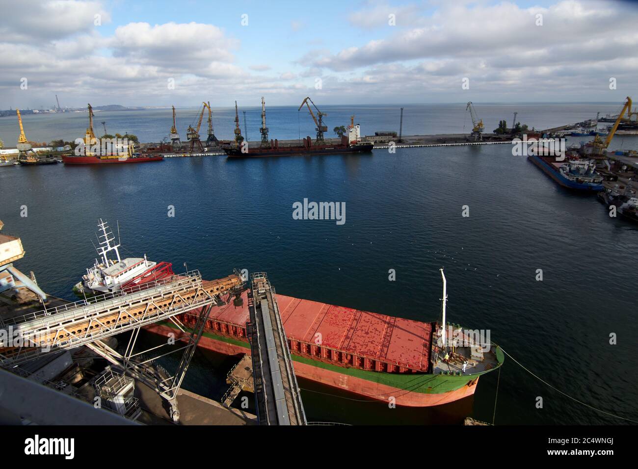 Ship mooring. Big grain terminal at seaport. Preparation of cereals ...
