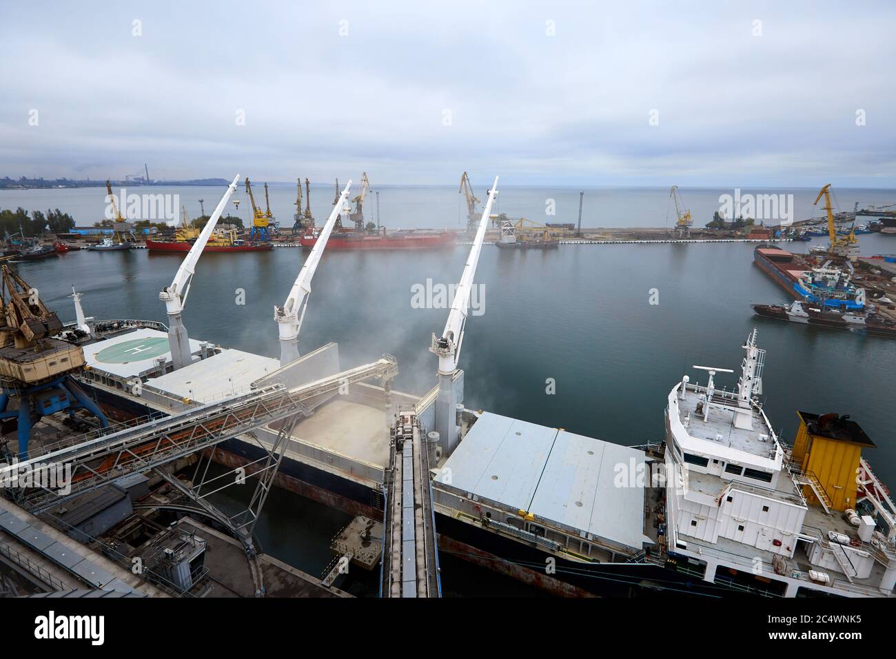 Big grain terminal at seaport. Cereals bulk transshipment from road ...